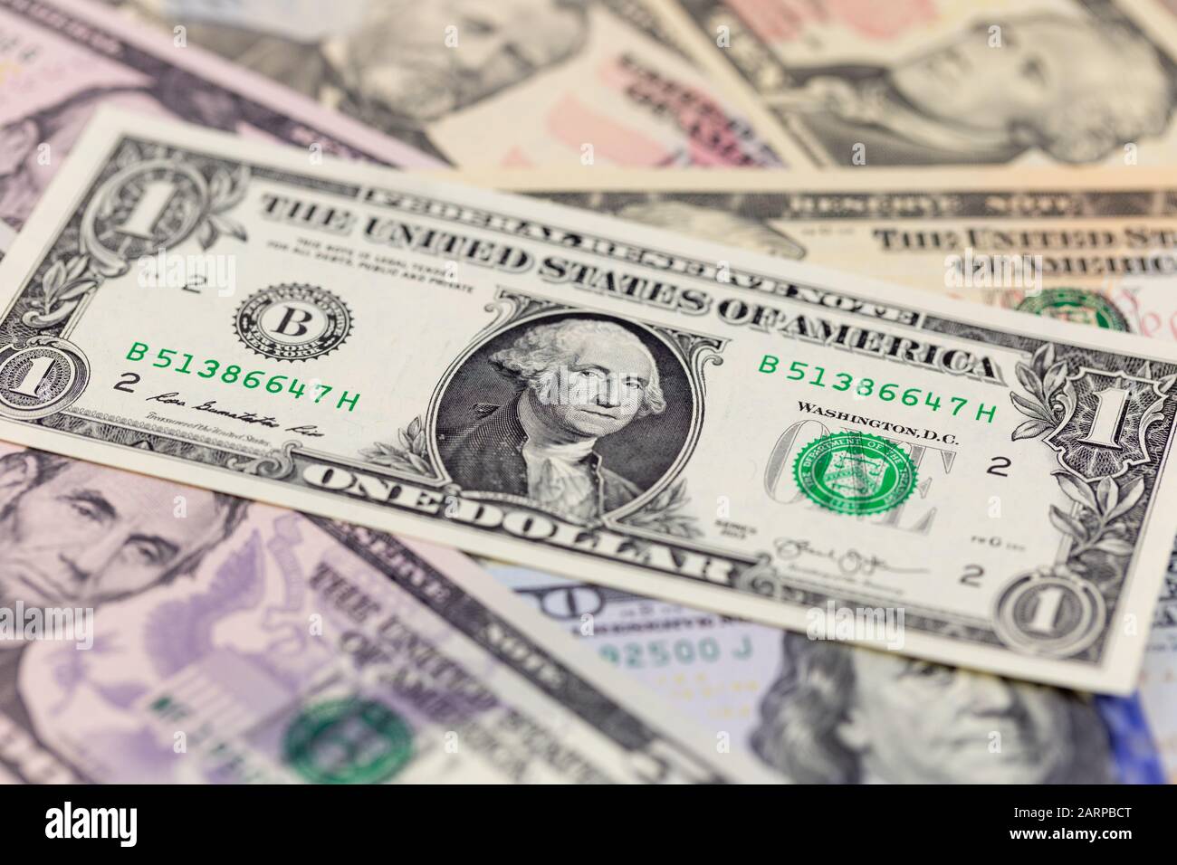 One dollar bill on american banknotes, business background Stock Photo ...