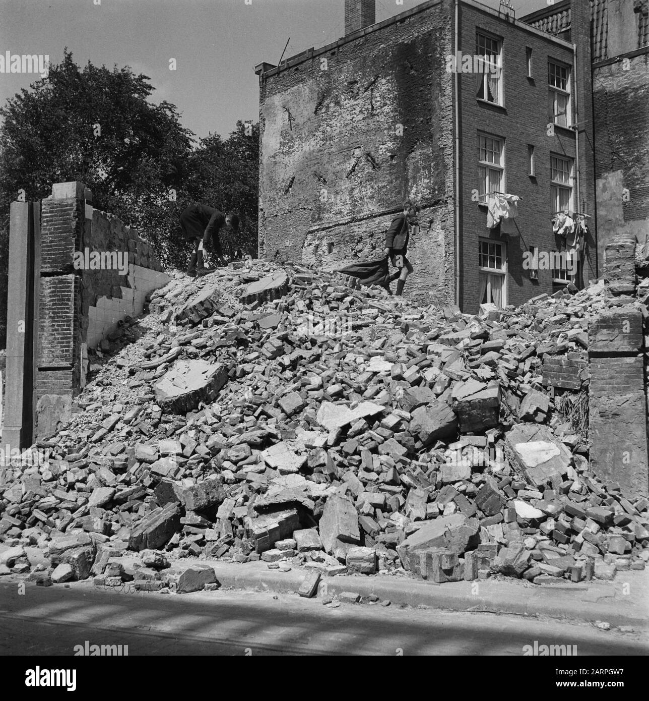 Devastation: Amsterdam Demolished houses in Amsterdam Date: 1945 ...