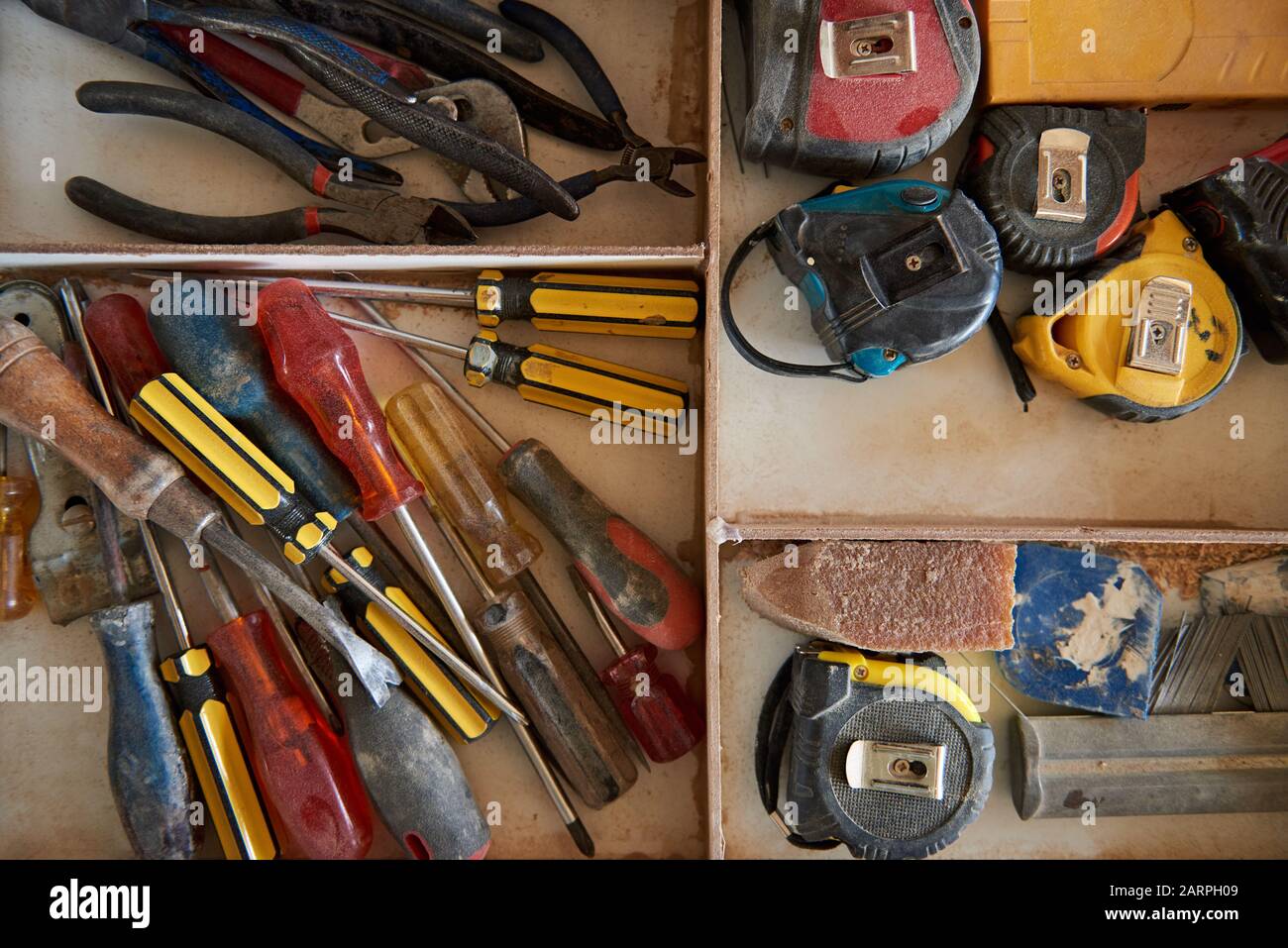 Variety of tools inside of a woodworker's toolkit Stock Photo - Alamy