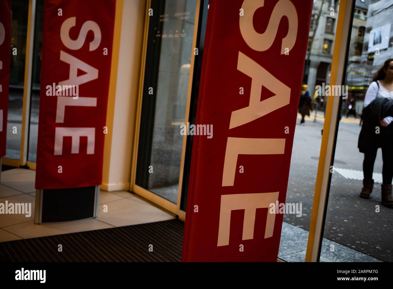 red sale sign in a shop january sales Stock Photo - Alamy