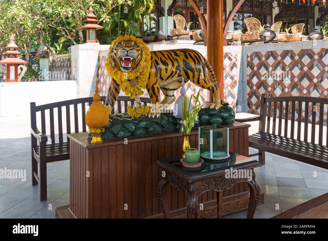Ornate features in the grounds of Chatrium Hotel at Royal Lake, Yangon ...
