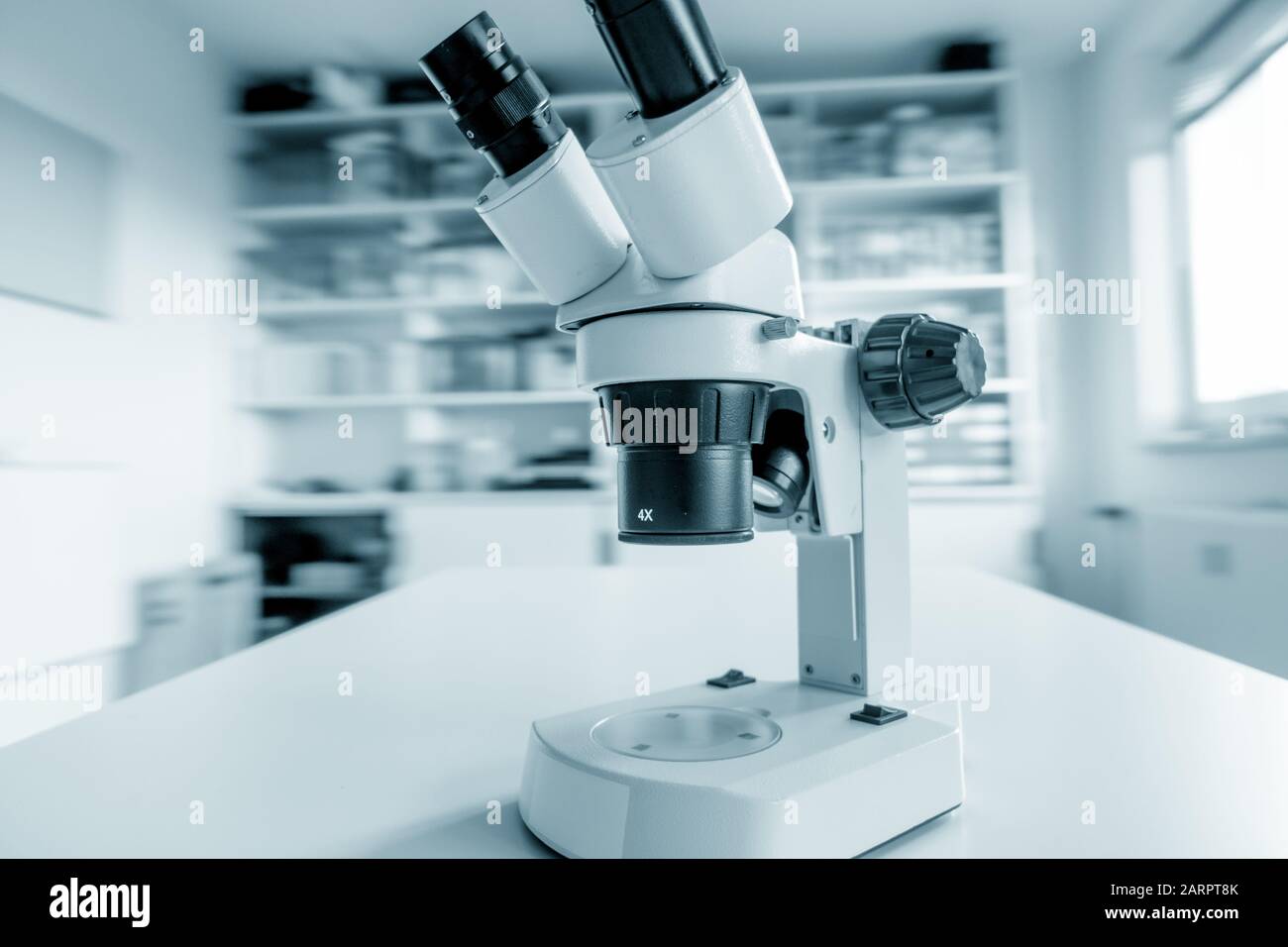 Laboratory microscope with blurred background Stock Photo - Alamy