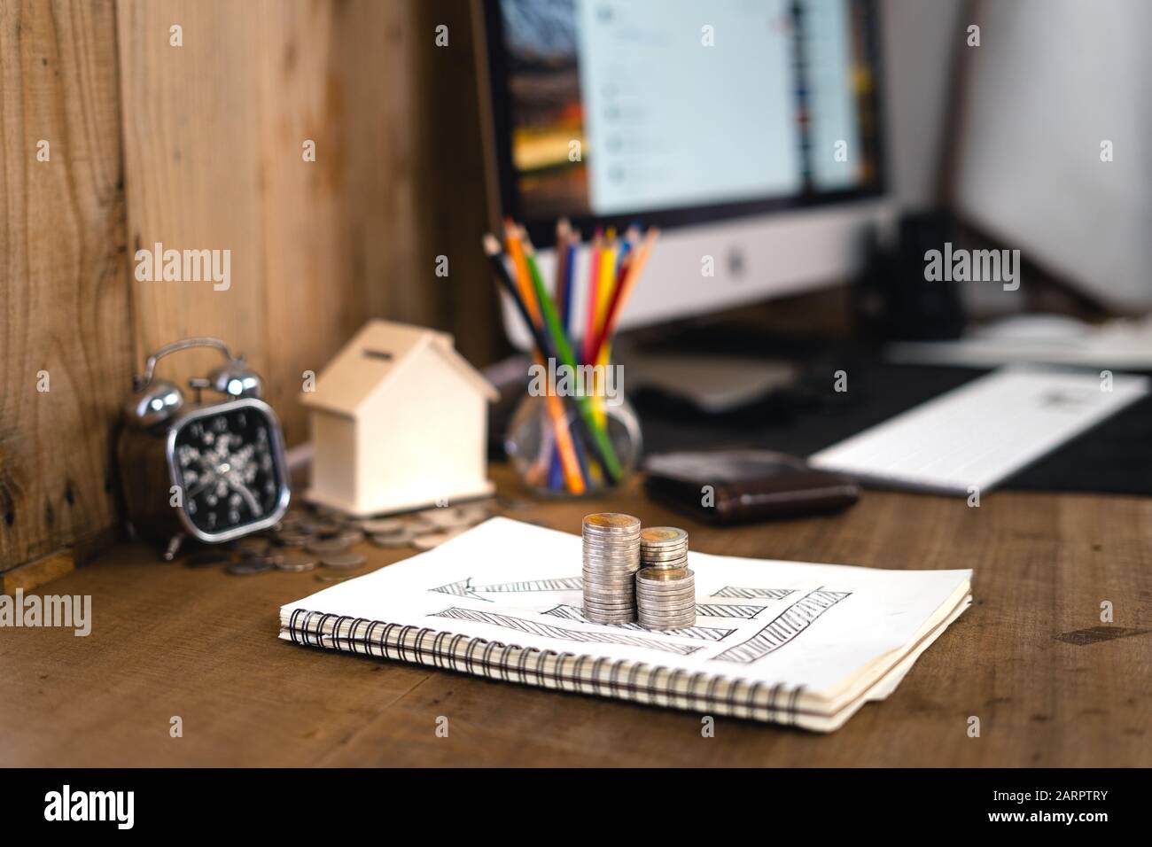 Money growing concept-Money and income graph drawing On Home office ...