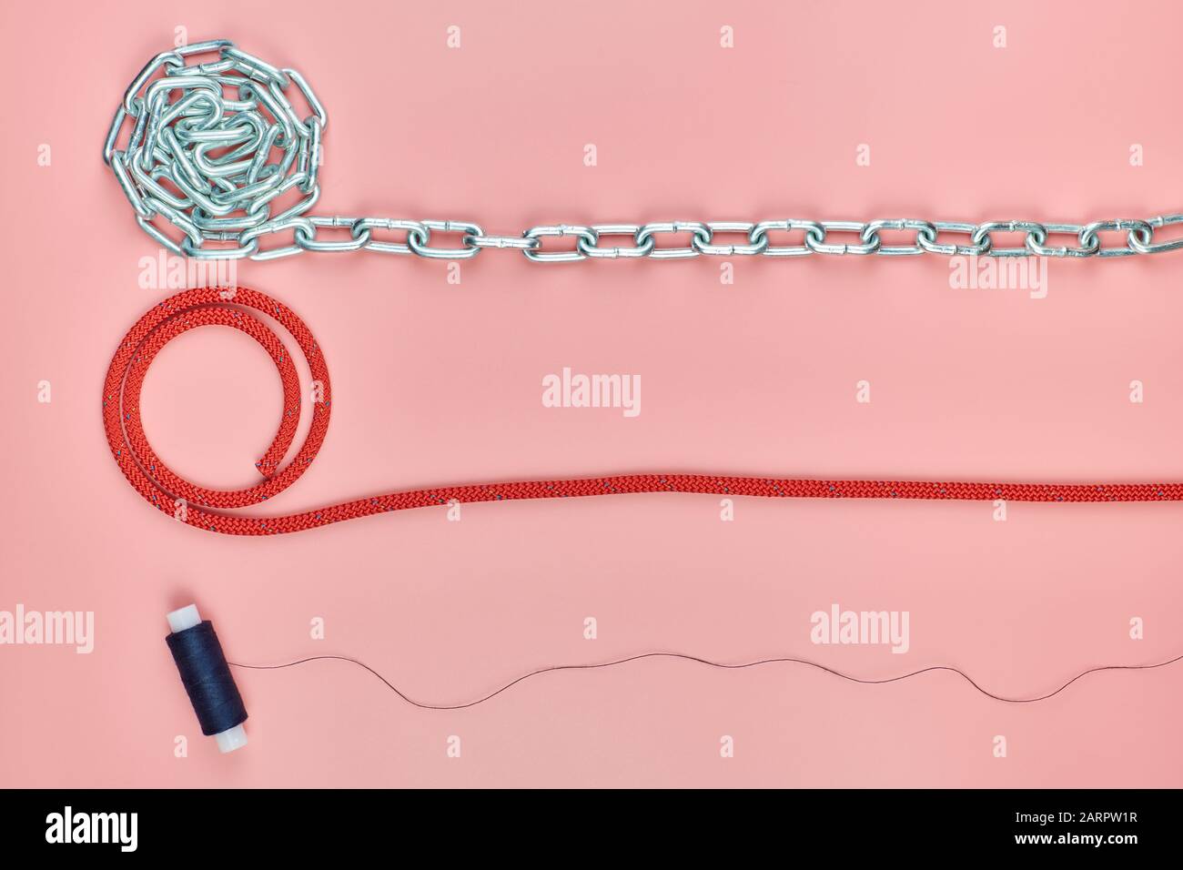 Chain, braided nylon rope and thread. Strength comparison concept ...
