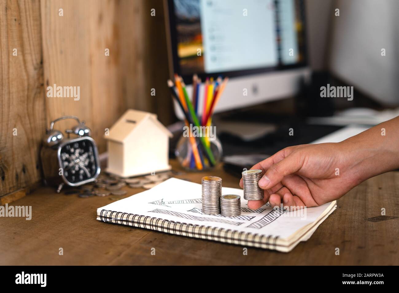 Money growing concept-Money and income graph drawing On Home office ...