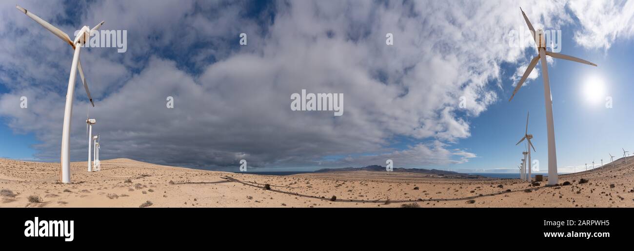 wind turbine in the desert with blue sky background. wind mill farm in ...