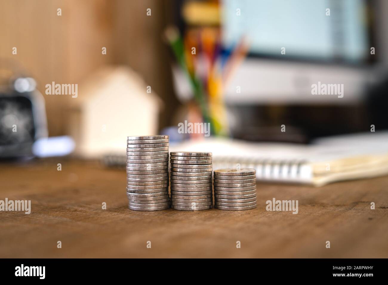 Money growing concept-Money and income graph drawing On Home office ...