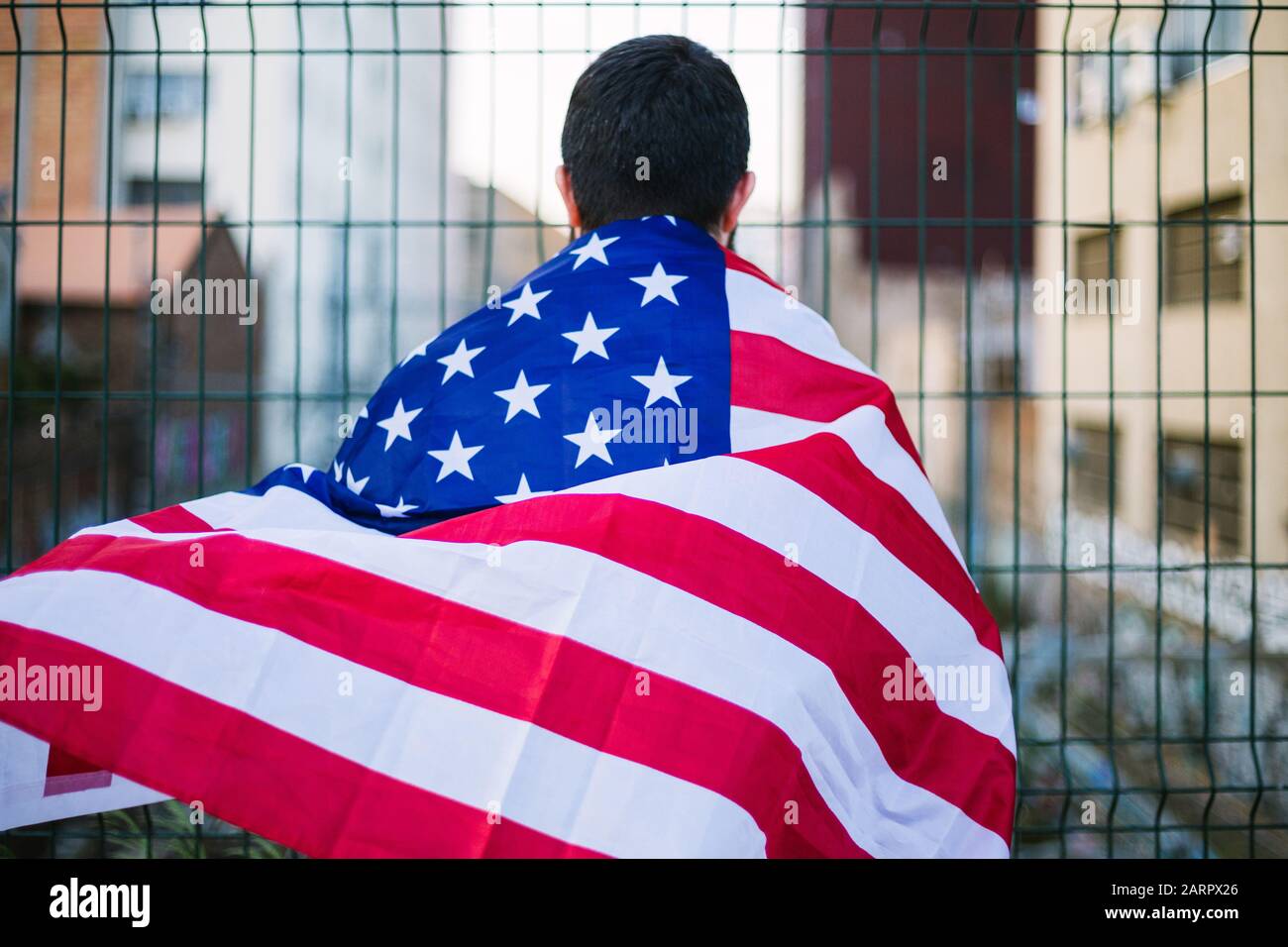 Brown guy with an American flag hanging from his back. United States ...