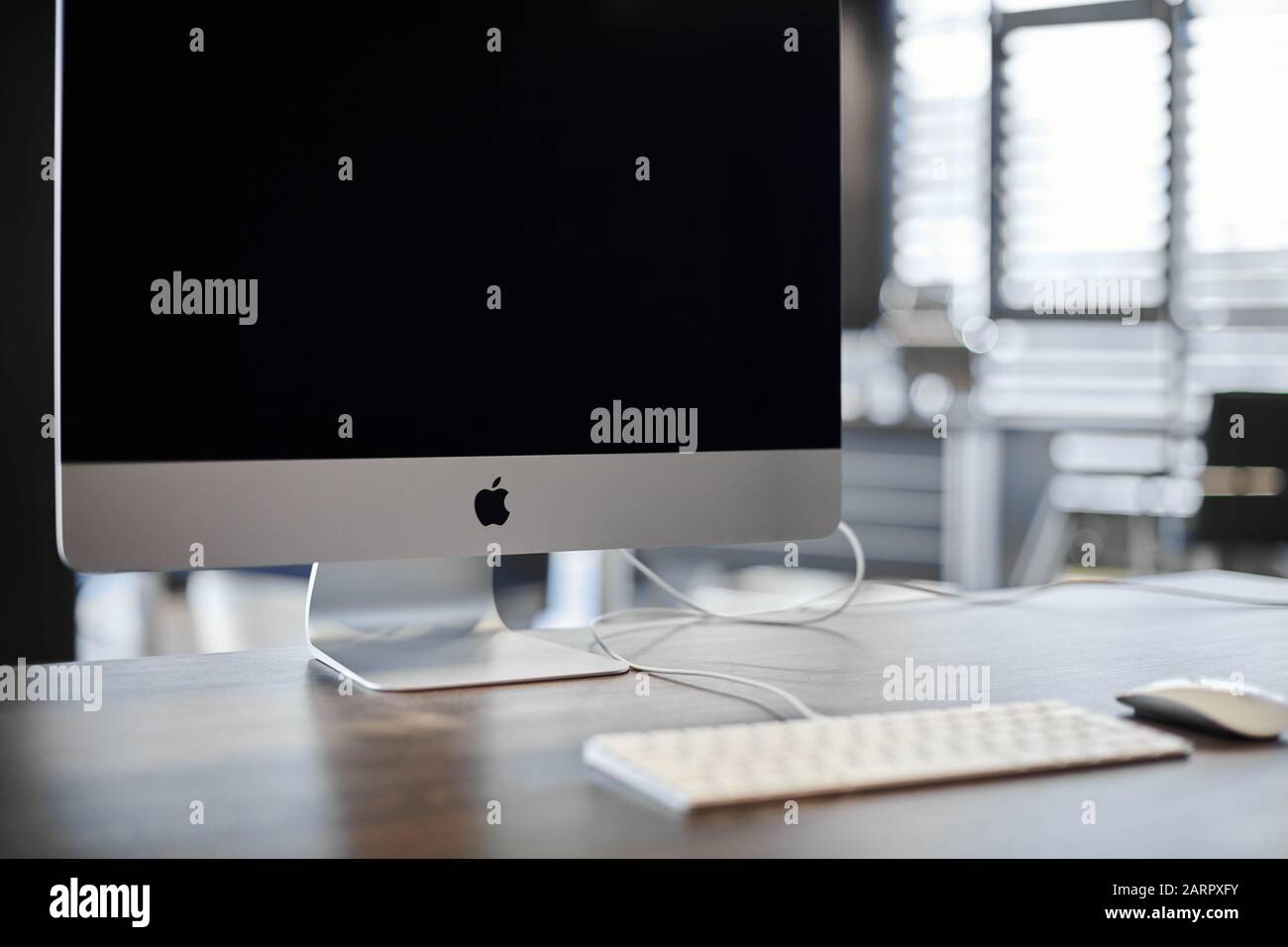 Modern workplace with Apple iMac computer. Office work place for ...