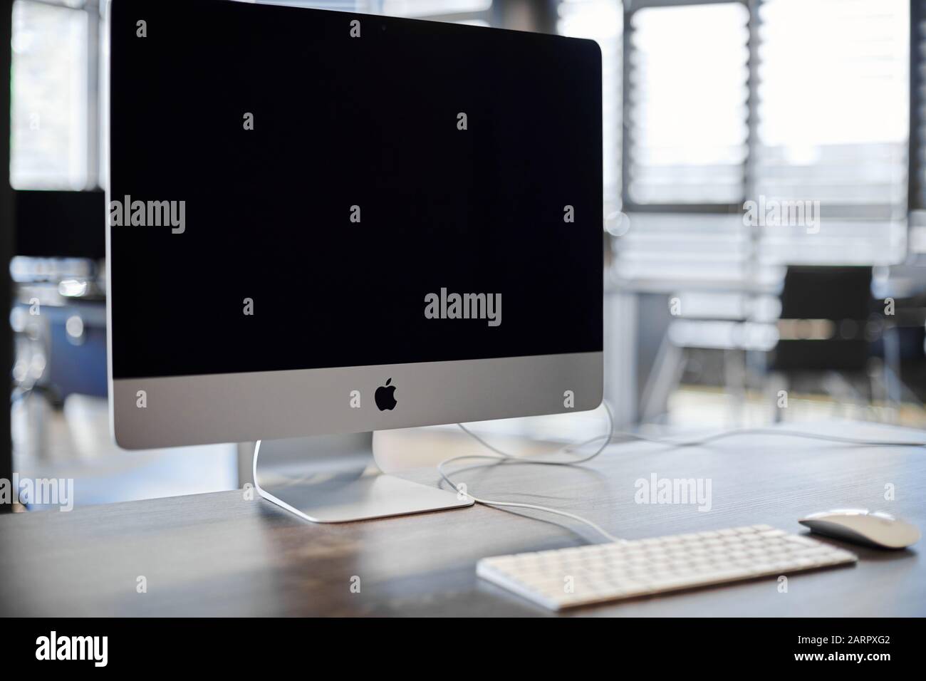 Modern workplace with Apple iMac computer. Office work place for ...