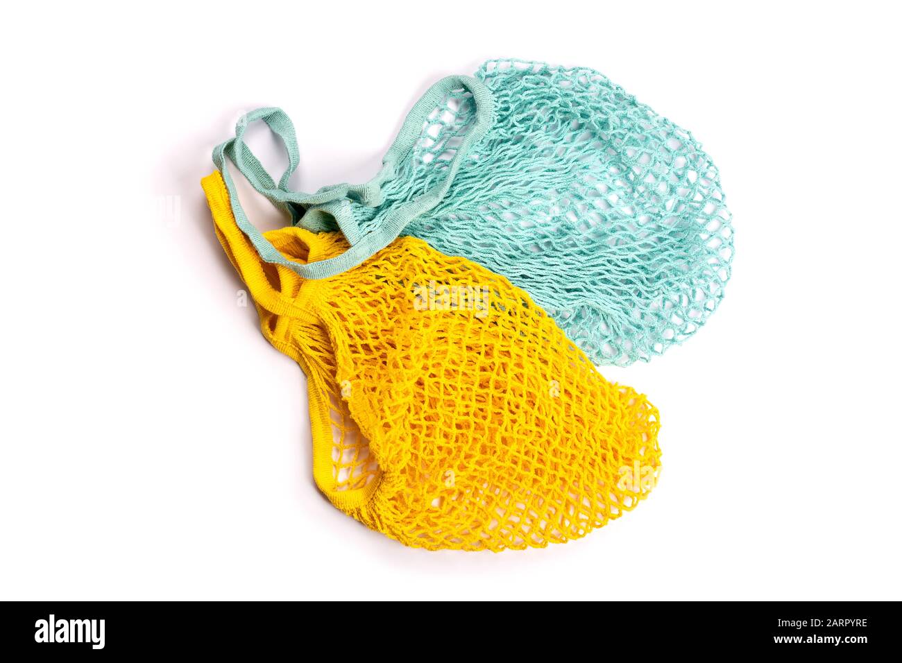 Yellow and blue string mesh reusable bags isolated on white Stock Photo ...