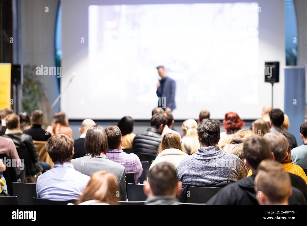Business speaker giving a talk at business conference event Stock Photo ...