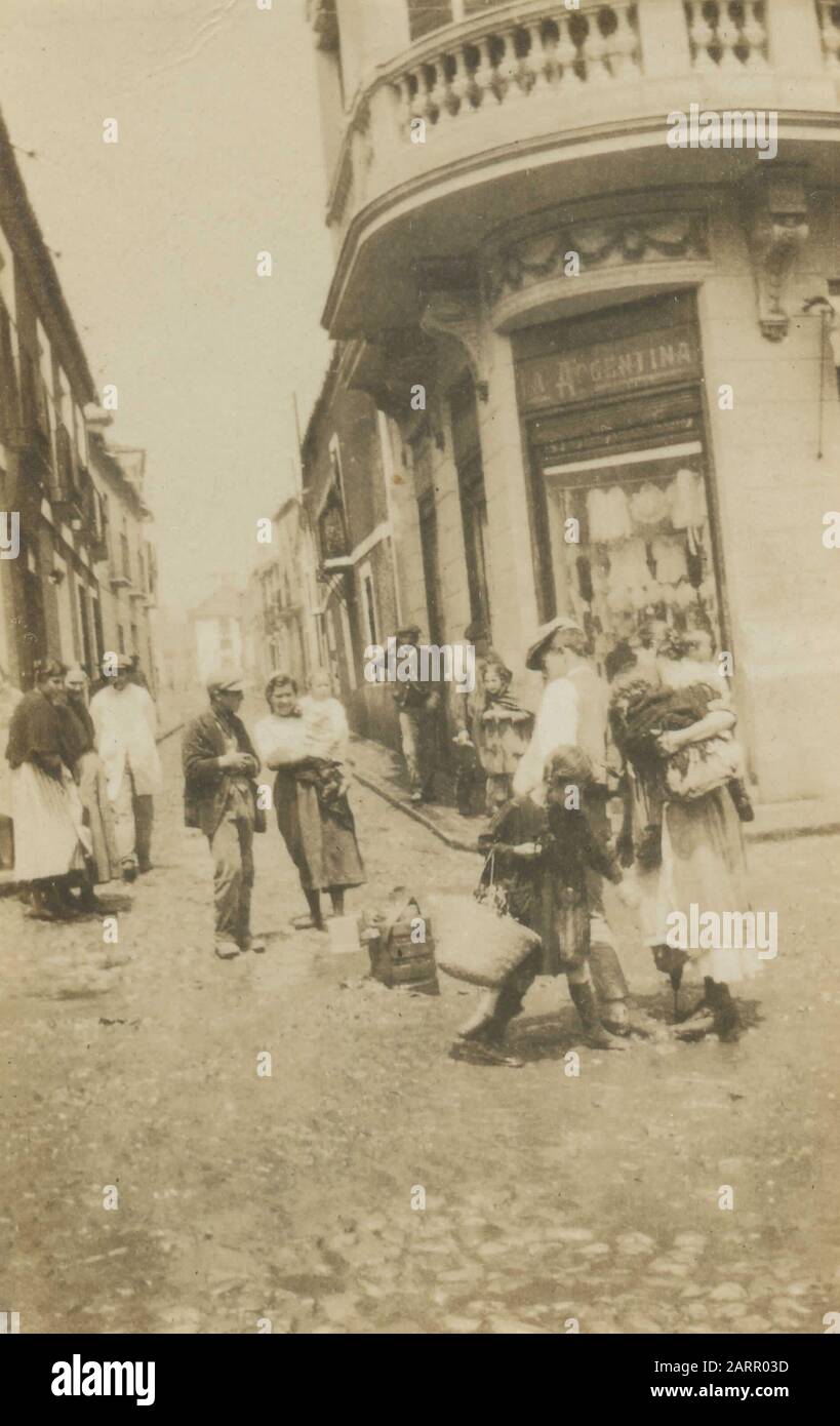 Street scene with children and shops, Italy 1910s Stock Photo - Alamy