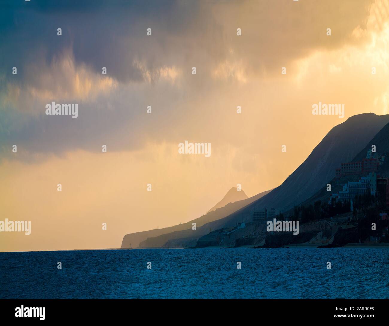 Hazy mountain range against sunset sky Photo Panorama Stock Photo - Alamy