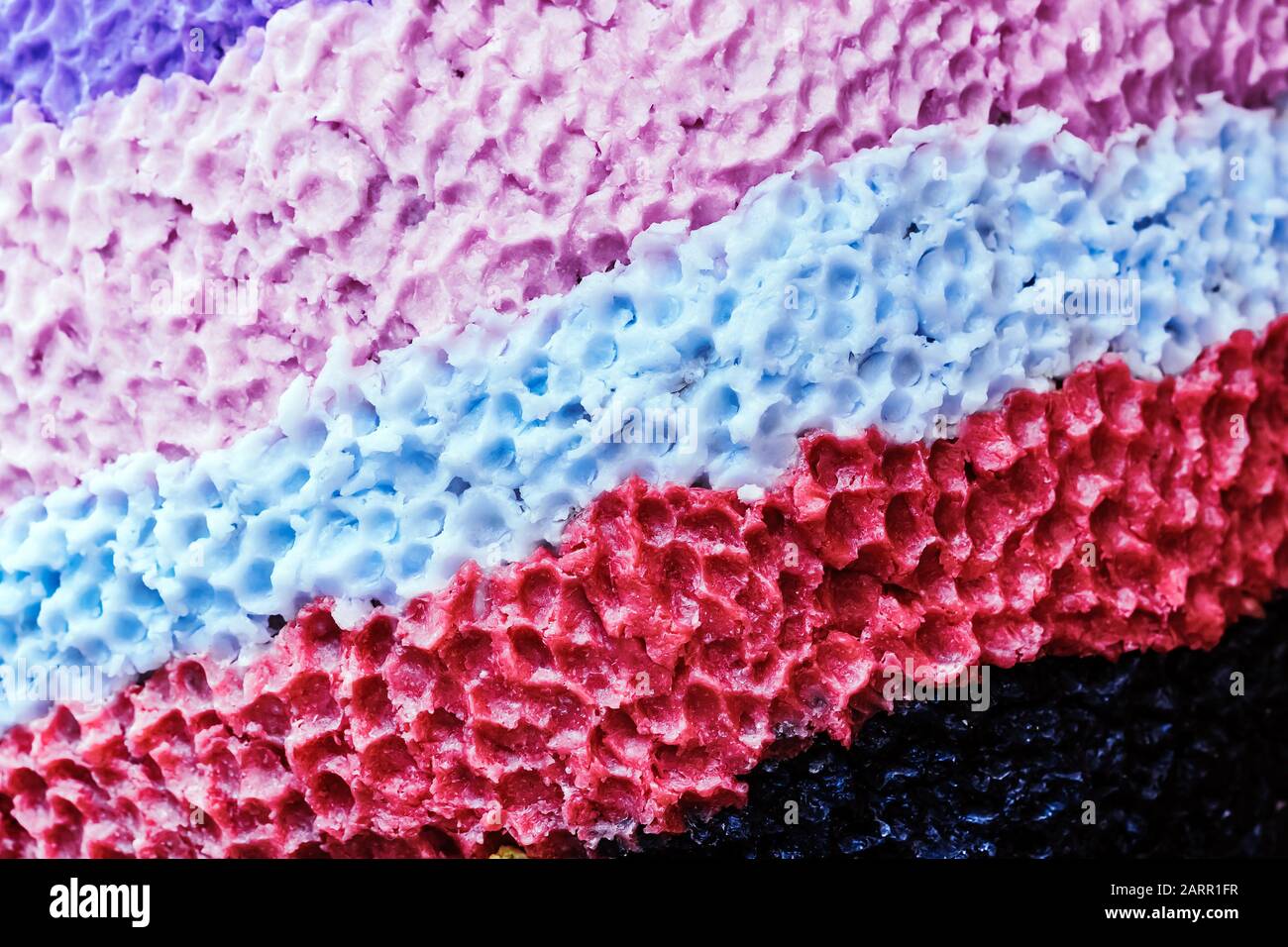 Close up to beautiful of various rough textures and colors of candles ...