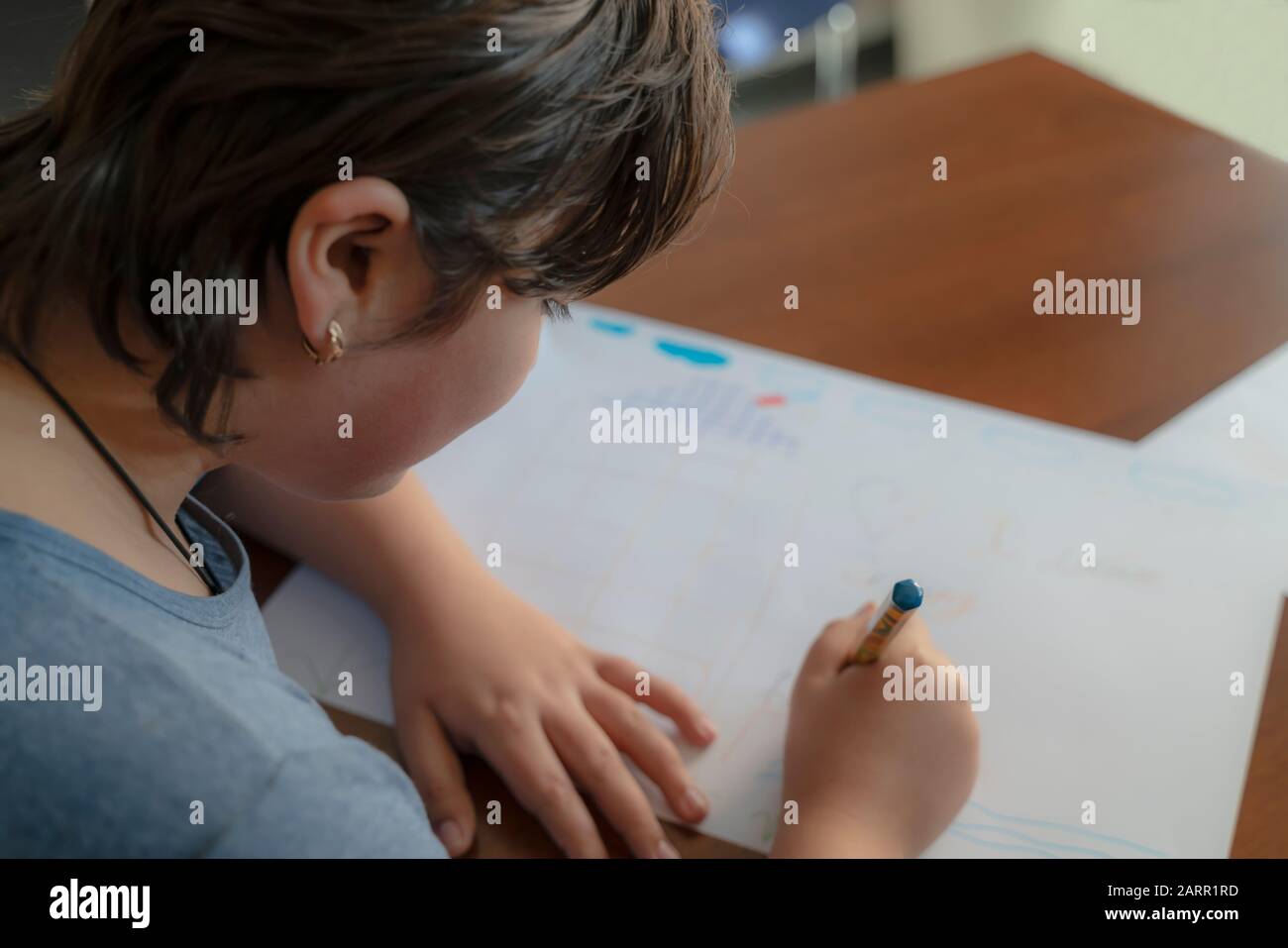 Facial profile view of mixed race girl, drawing picture with colored ...
