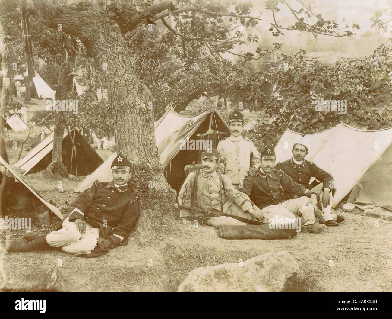 Military encampment with Italian soldiers, 1880s Stock Photo - Alamy