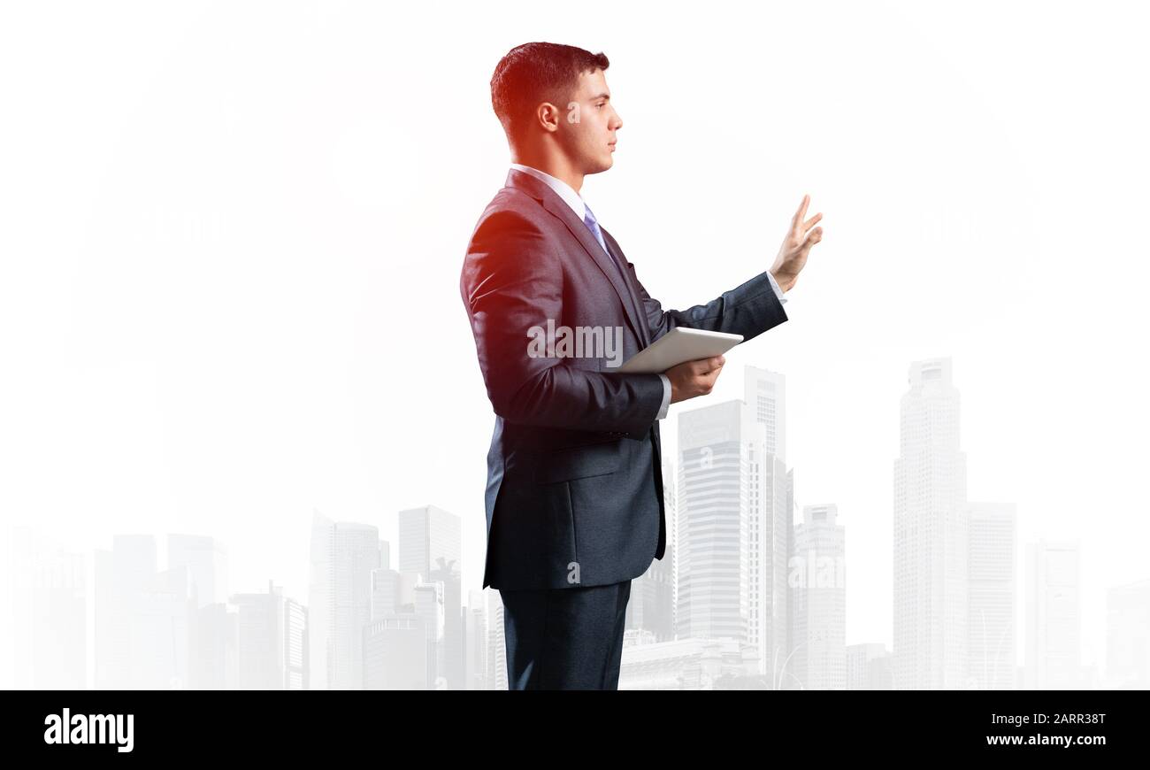 Side view of manager in business suit and tie Stock Photo - Alamy