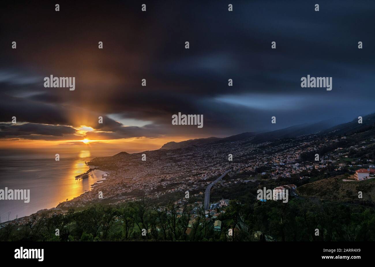 Sunset over Funchal, the capital city of Madeira Island Stock Photo - Alamy