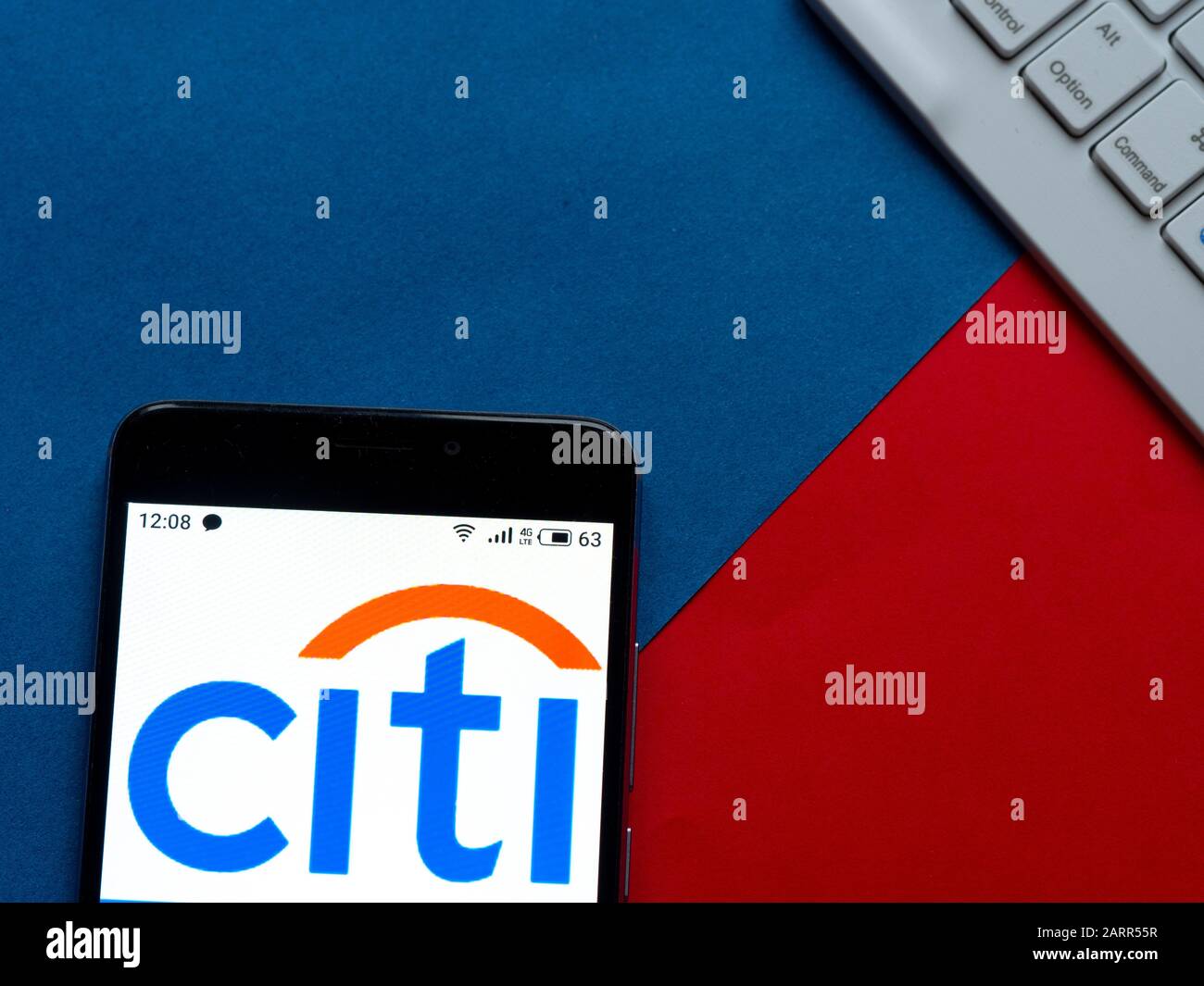 In this photo illustration a Citibank logo seen displayed on a ...
