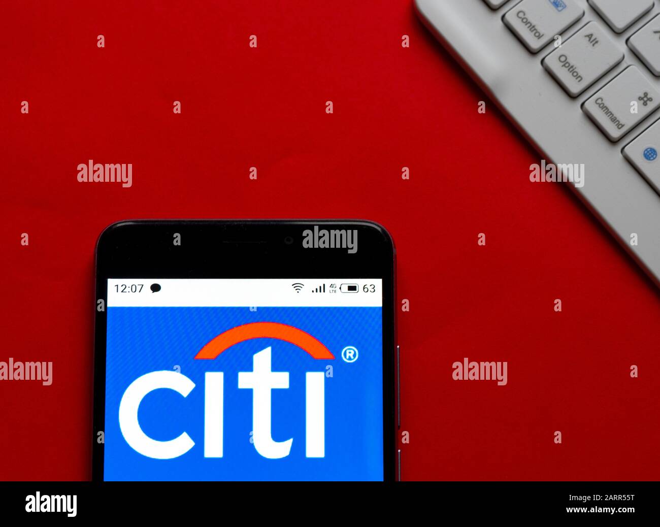 In this photo illustration a Citibank logo seen displayed on a ...