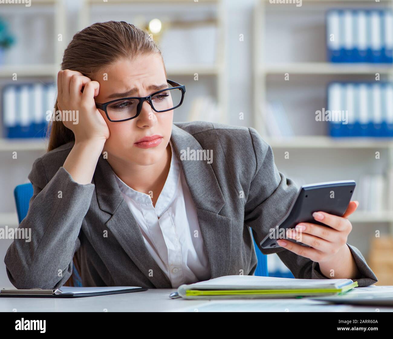 Sad attractive businesswoman counting hi-res stock photography and ...