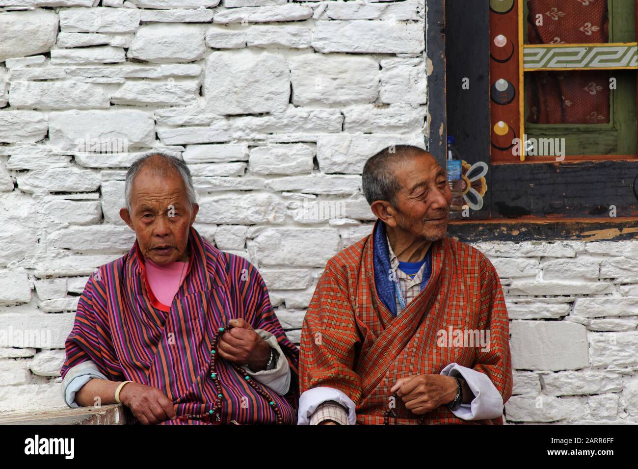Bhutan bhutanese in traditional dress hi-res stock photography and ...