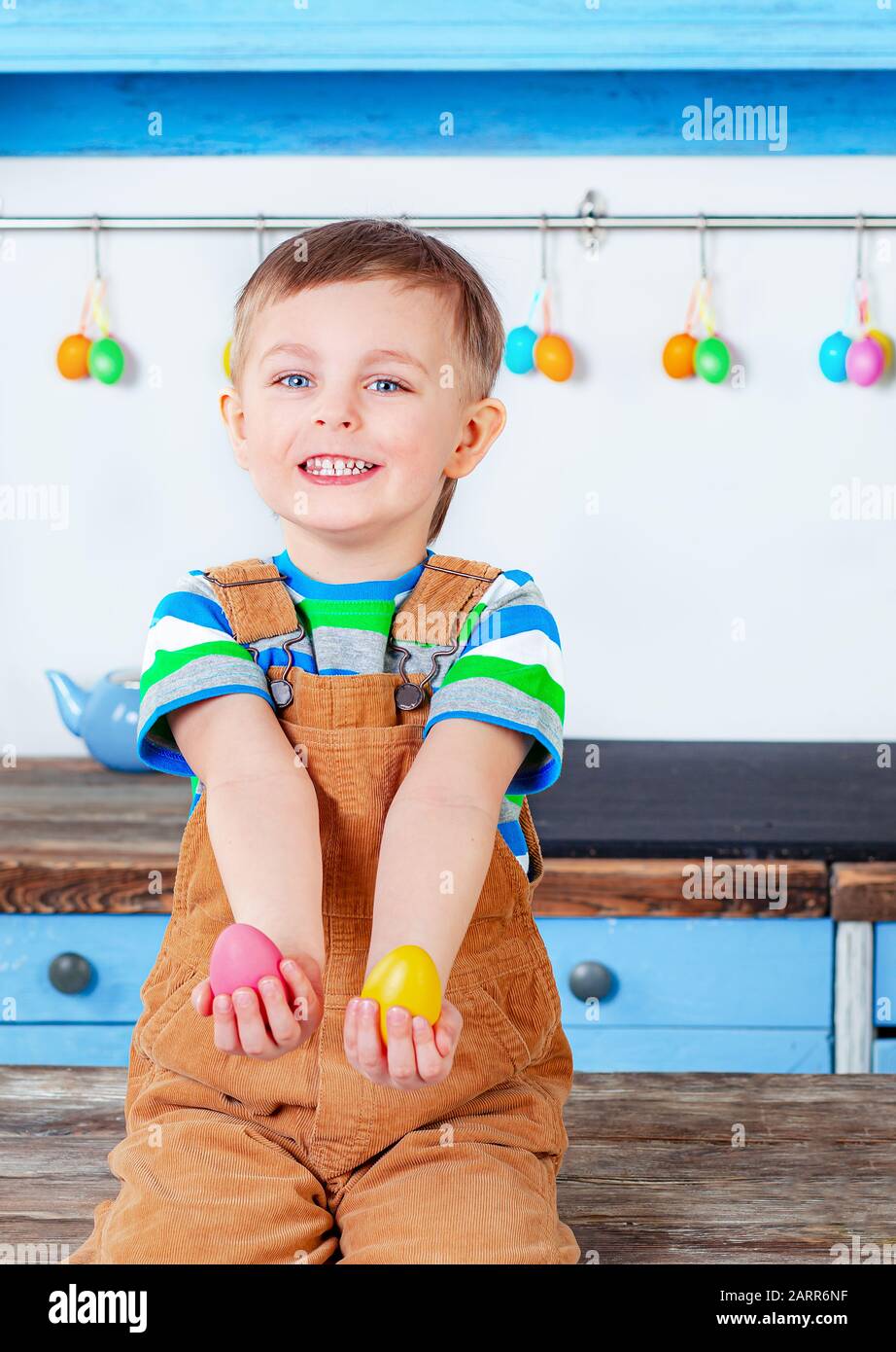 Happy easter. Cute boy getting ready for the holiday Stock Photo - Alamy