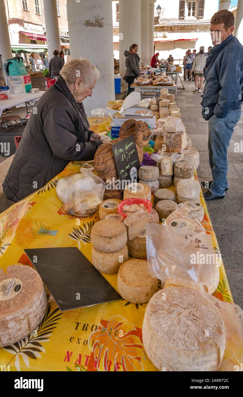 Cheese stand at Market Hall at Place Paoli in L'Ile-Rousse, Balagne ...