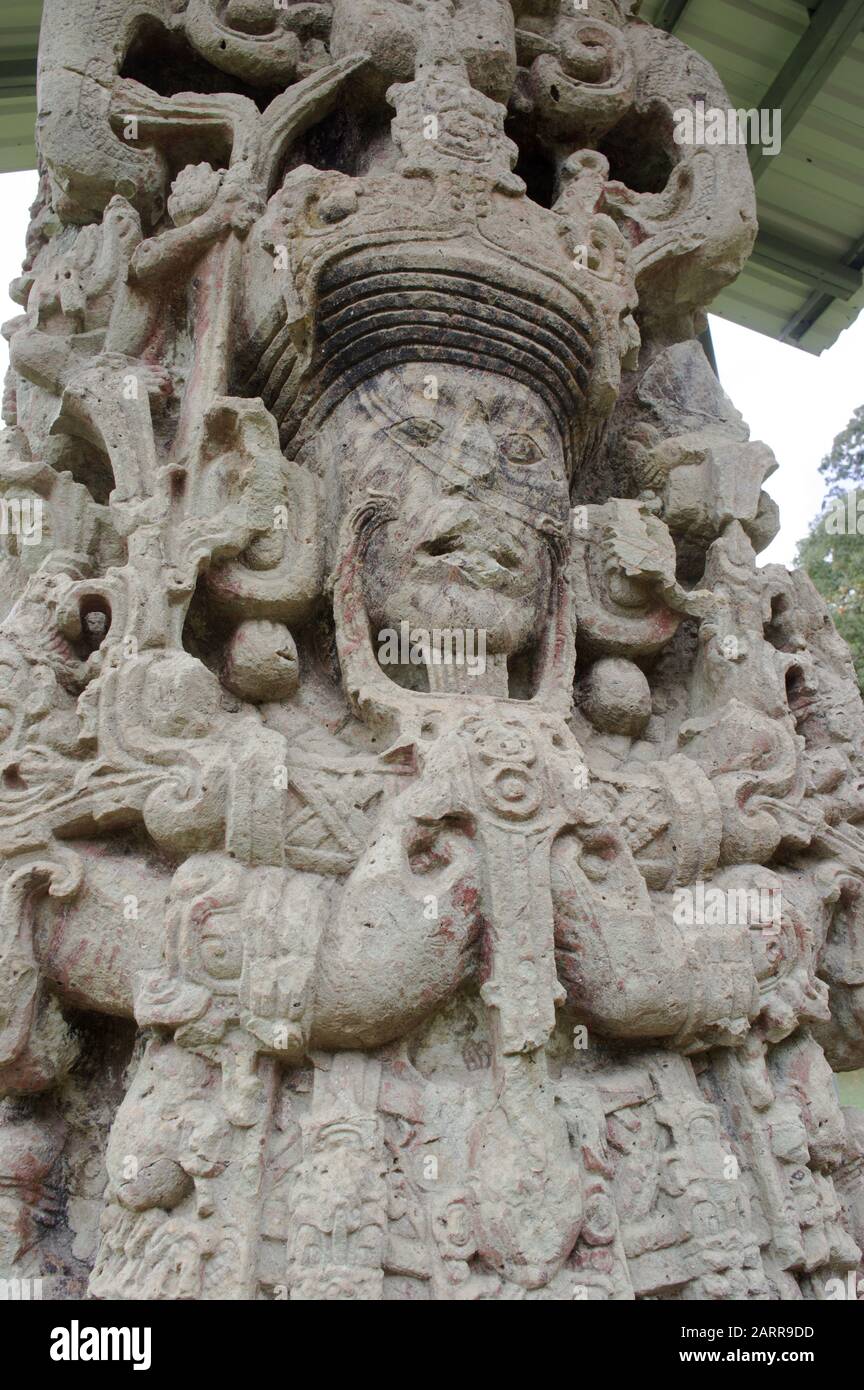 Statue by the ruins of ancient pyramids in Copan, Honduras Stock Photo ...