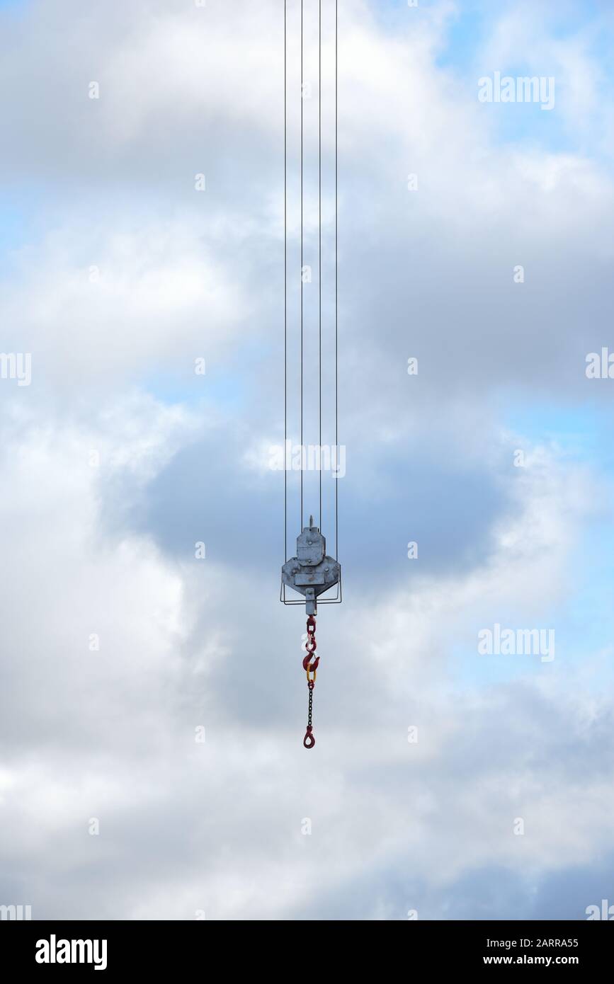 Crane hook hanging over an empty sky suspended in mid air Stock Photo ...