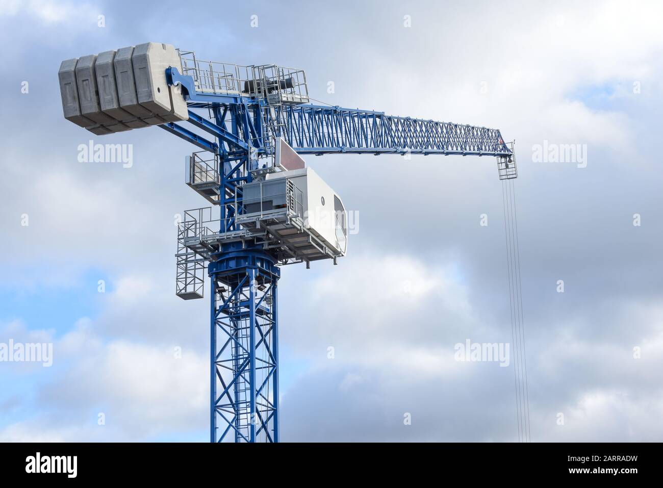Large blue crane on a construction site on a commercial development ...