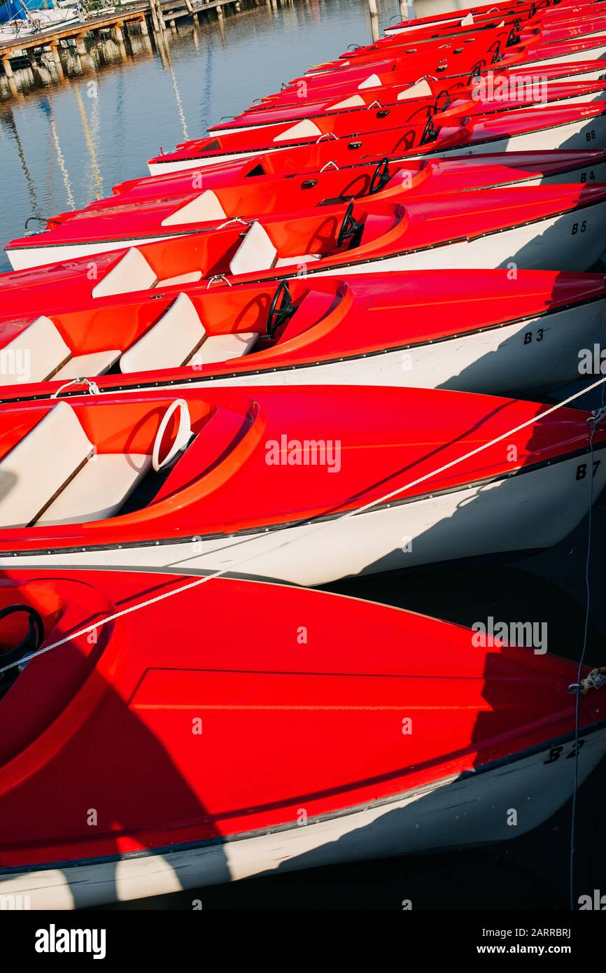 red motor boat with steering wheel for hire Stock Photo - Alamy