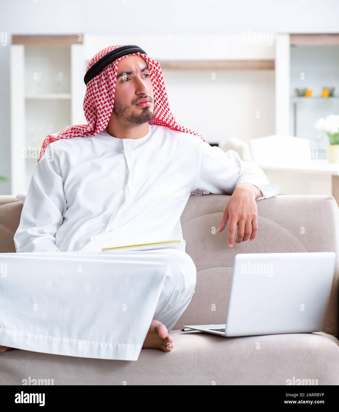 The arab man working at home on his work Stock Photo - Alamy