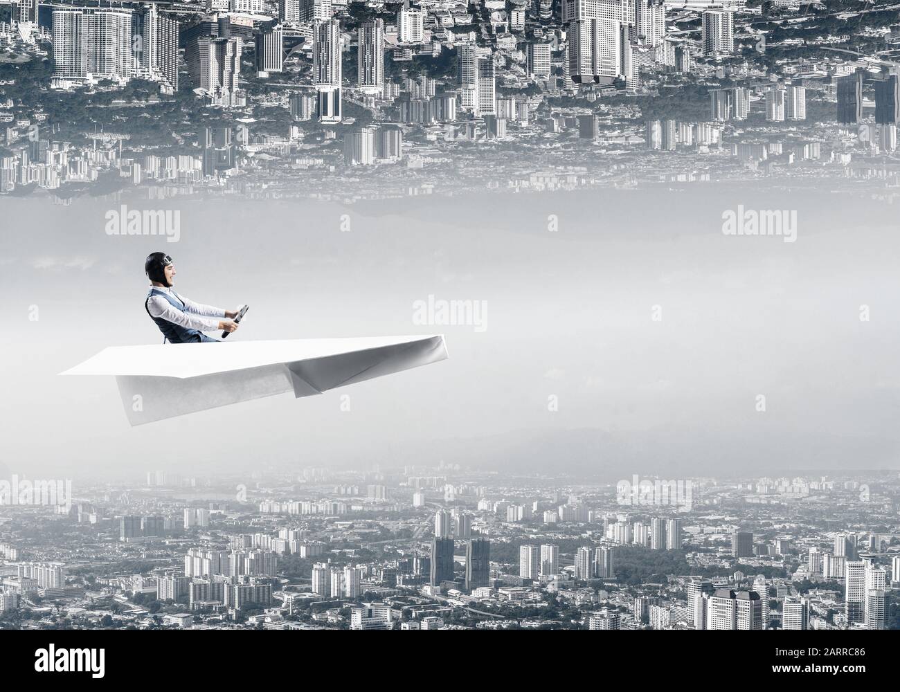 Happy aviator driving paper plane Stock Photo - Alamy