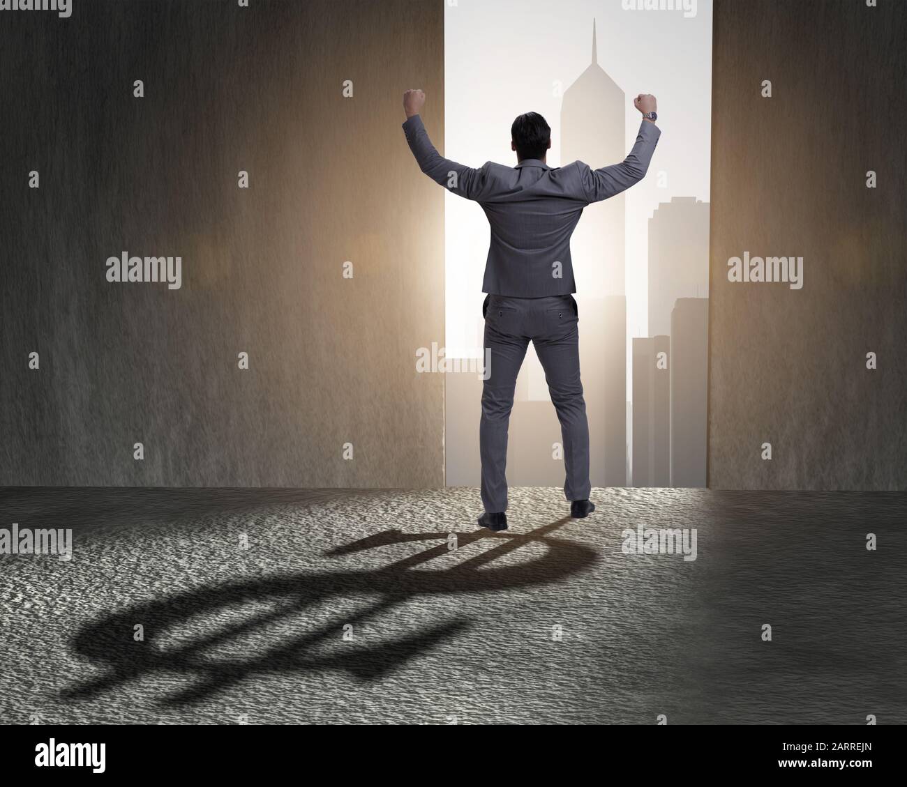 The businessman casting dollar shape shadow in business concept Stock ...