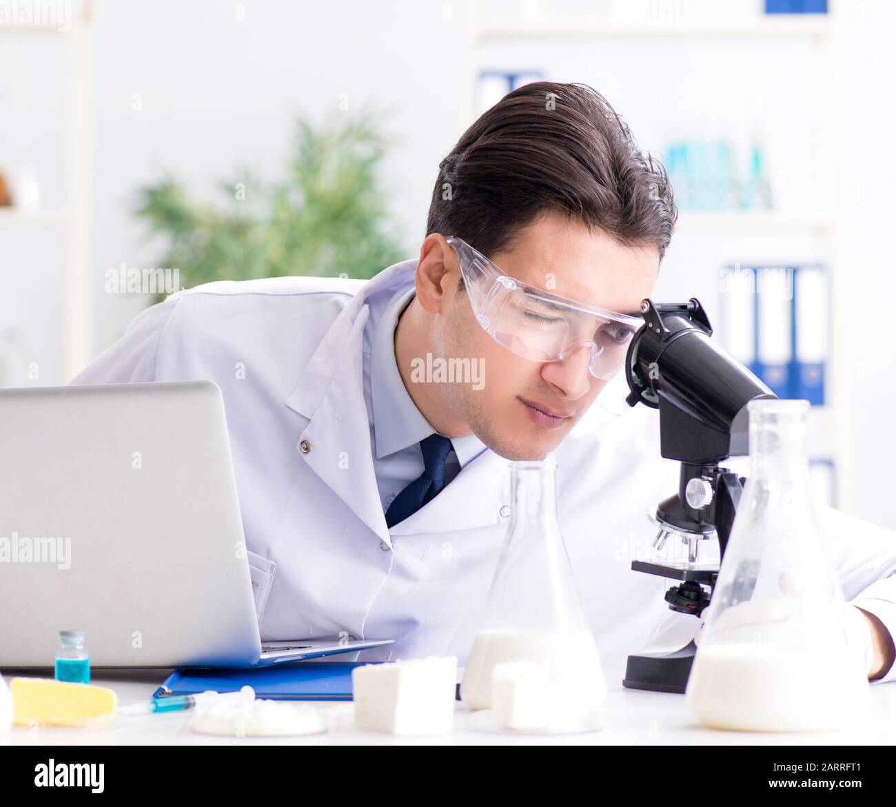 Student testing food in lab hi-res stock photography and images - Alamy