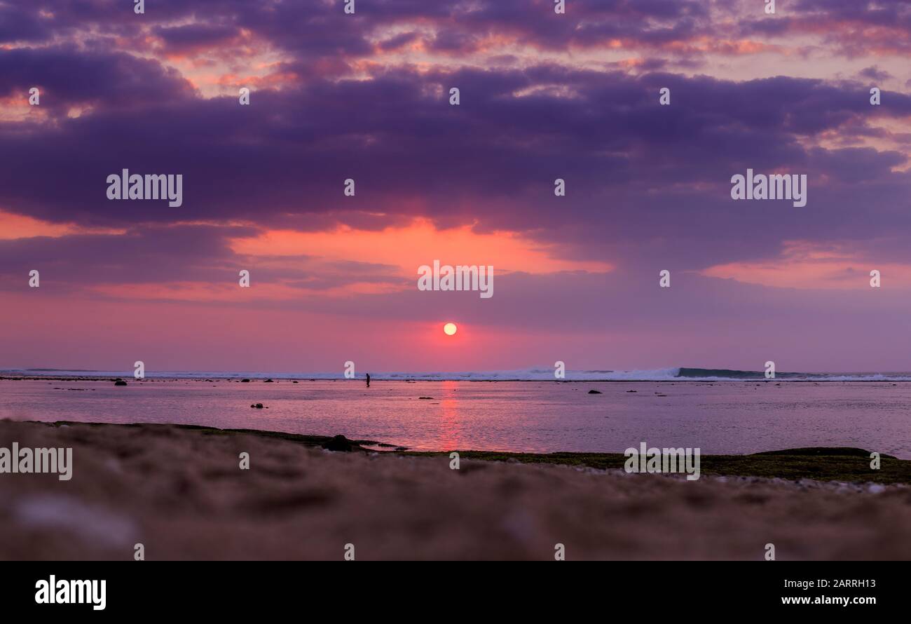 Tropical sunset. Bali beach, Indonesia Stock Photo - Alamy