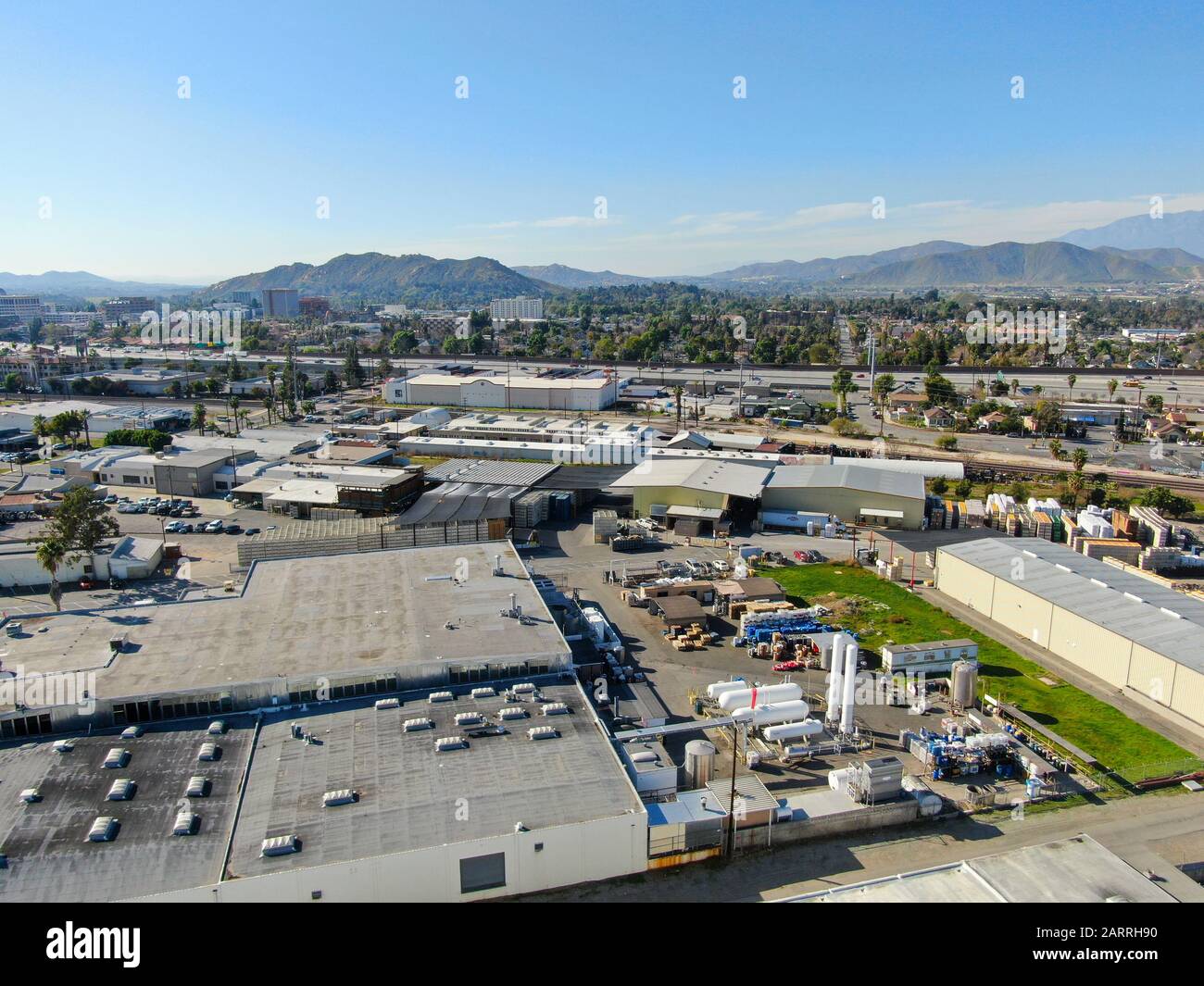 Aerial view to industrial zone and company storage warehouse in ...