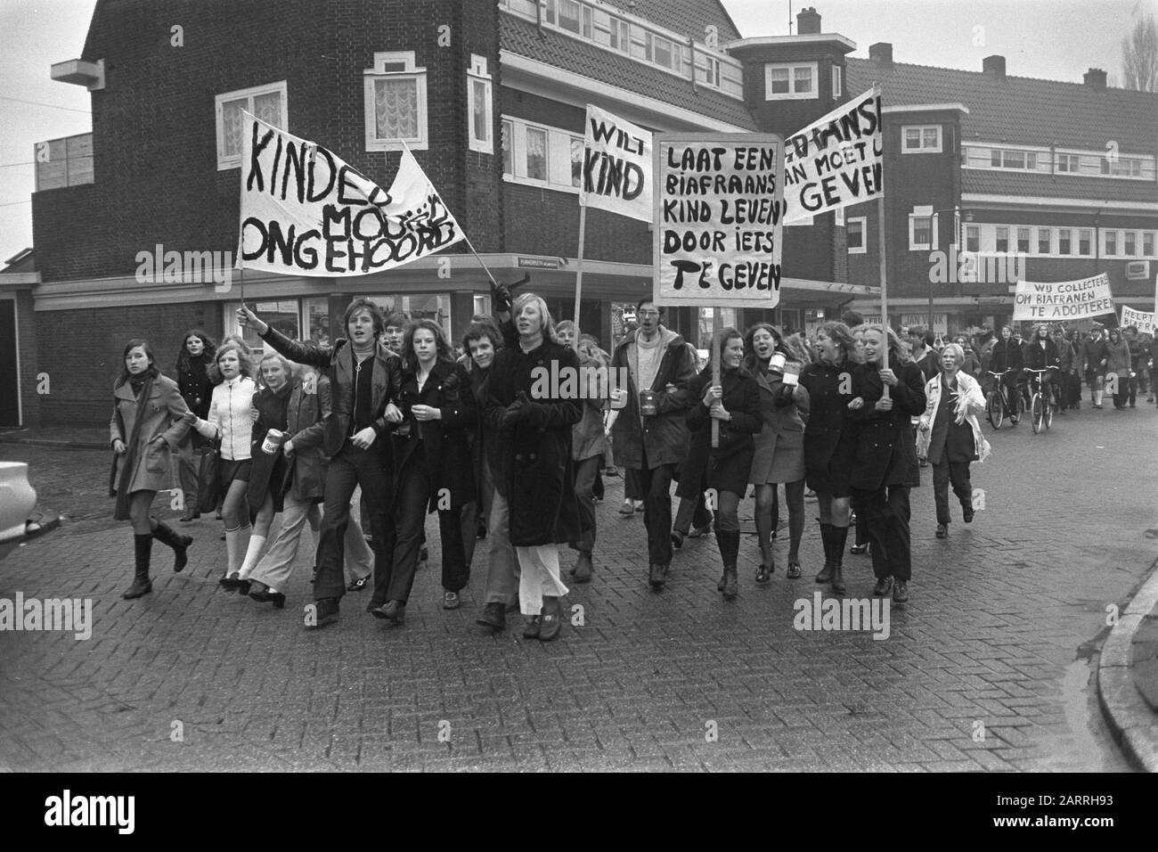 Students in Amsterdam North collect for Biafra. Parade with banners ...