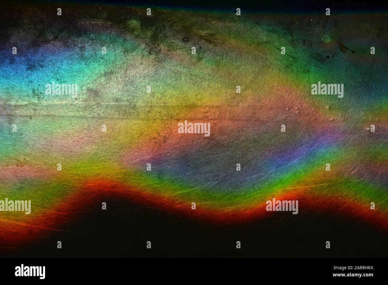 sunlight diffraction into rainbow colors on a metal sheet Stock Photo ...
