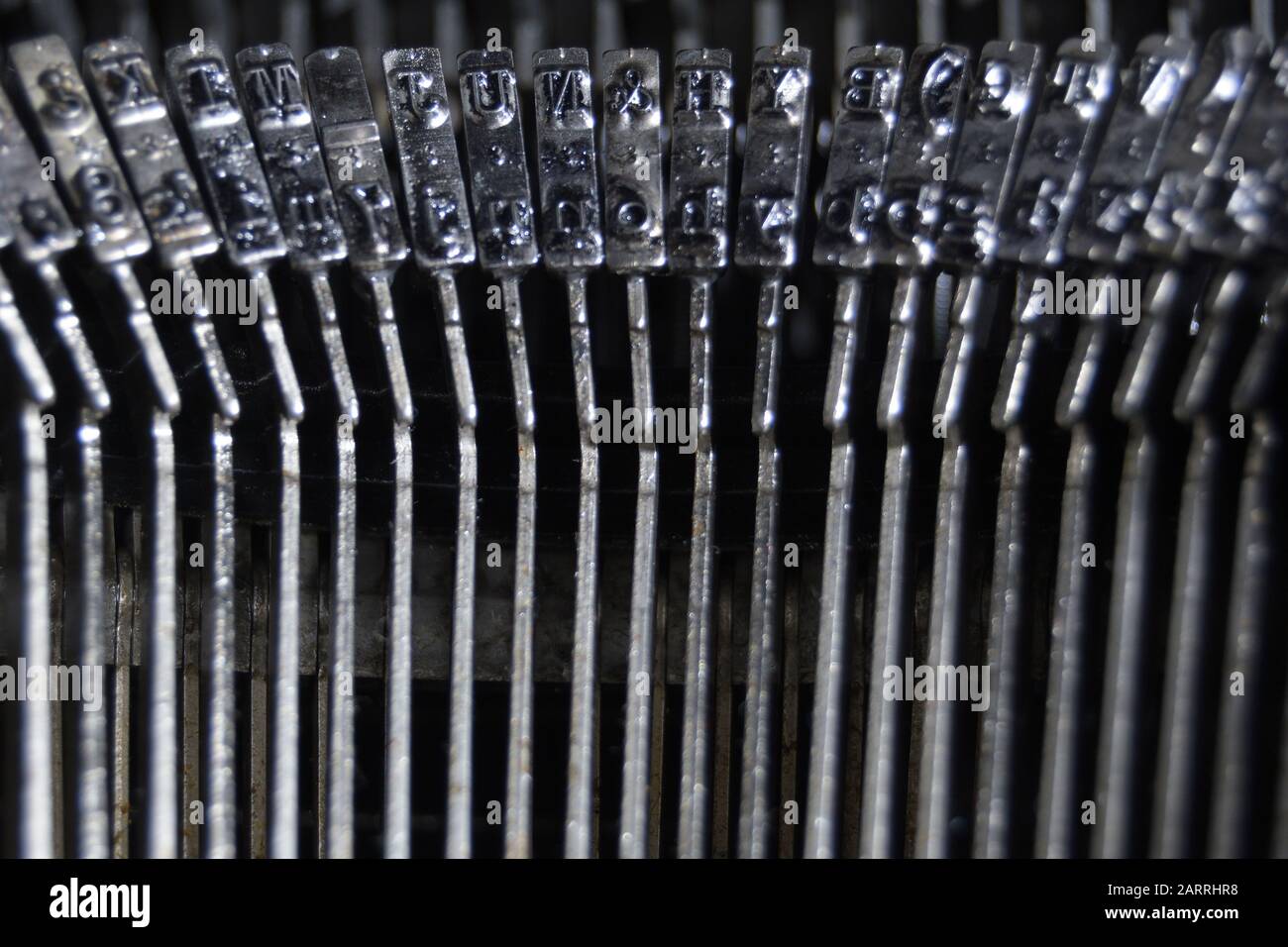 Letters with tint in the typo keys of a qwerty typewriter Stock Photo ...