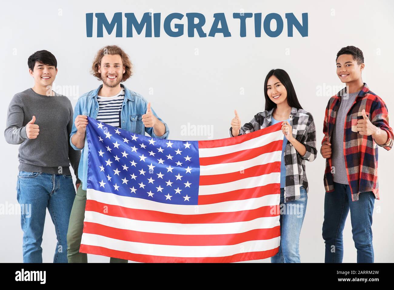 Group of students with USA flag and word IMMIGRATION on light ...