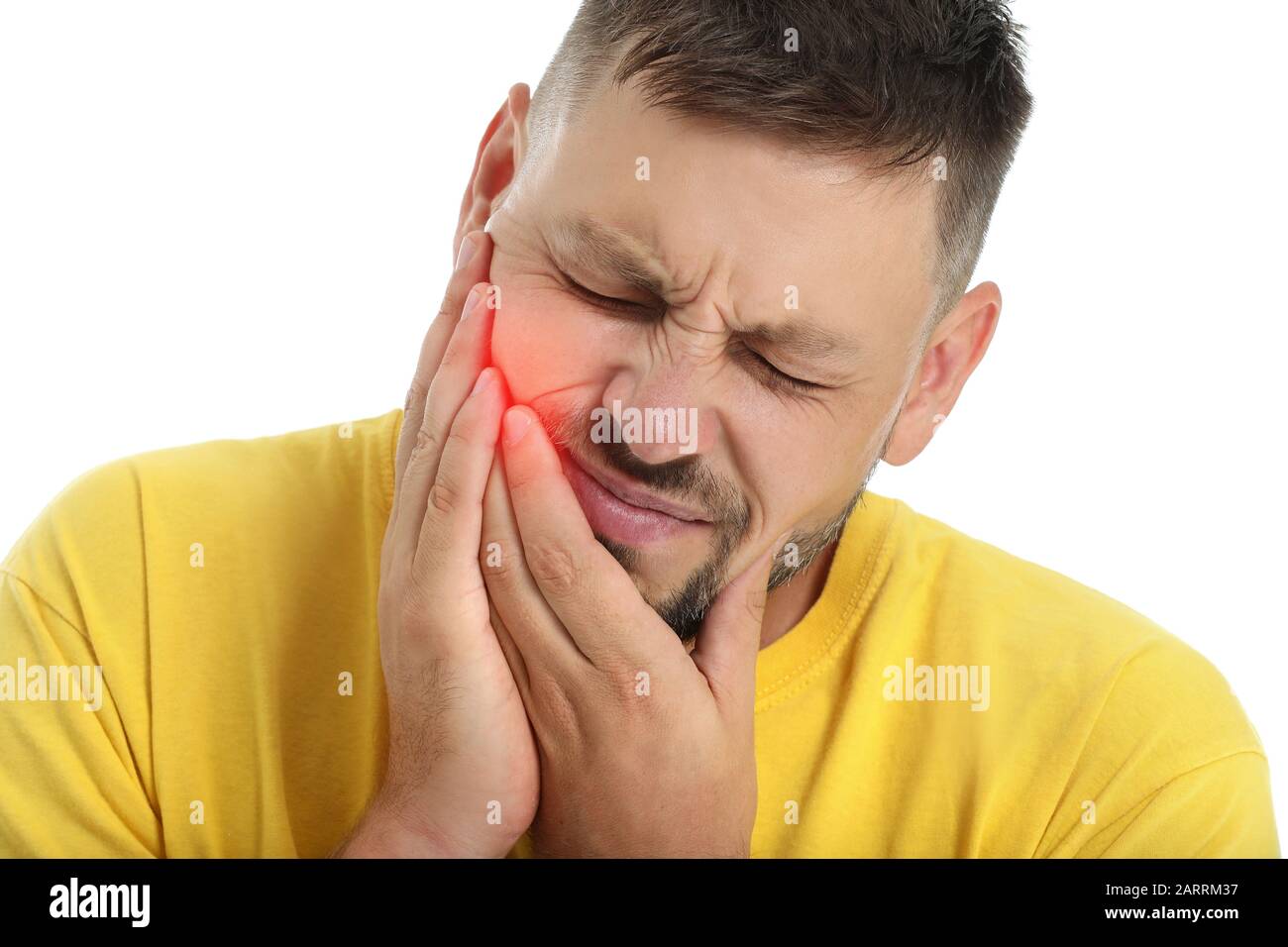 Man suffering from toothache on white background Stock Photo - Alamy