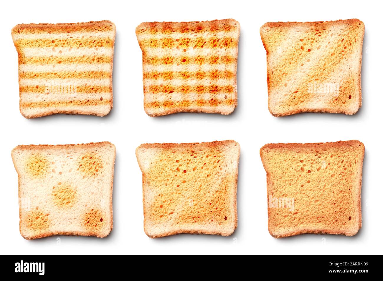 Different slices of toasted bread on white background, top view Stock ...