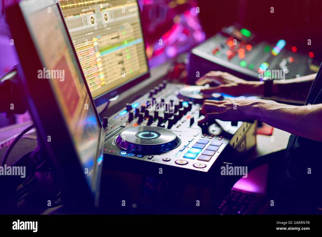 Dj mixes the track in the nightclub at a party Stock Photo - Alamy
