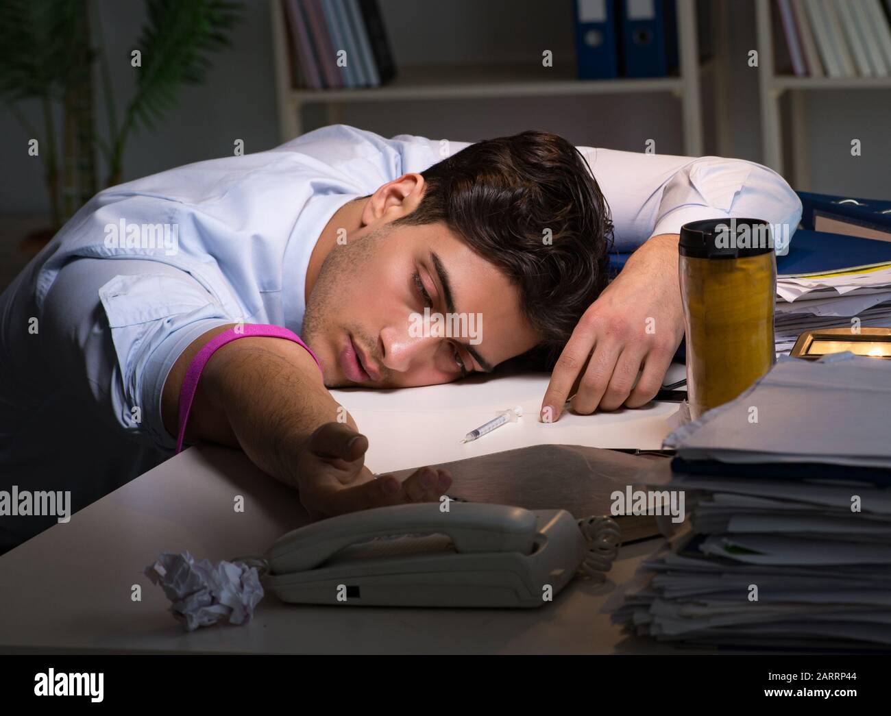 Employee relieving stress from overtime with drugs narcotics Stock ...