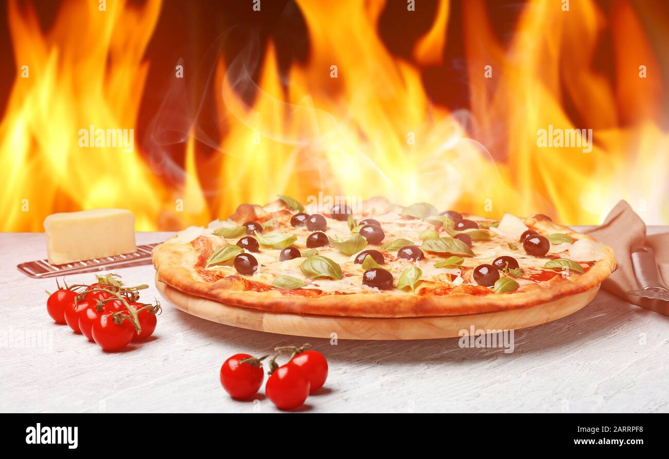 Hot pizza with smoke hi-res stock photography and images - Alamy