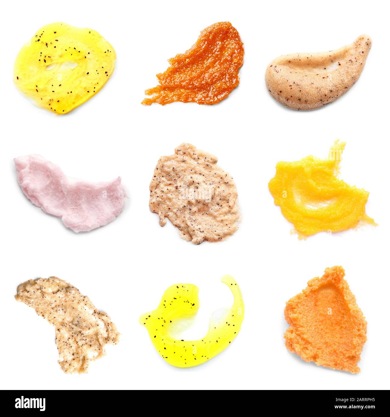 Samples of body scrub on white background Stock Photo - Alamy