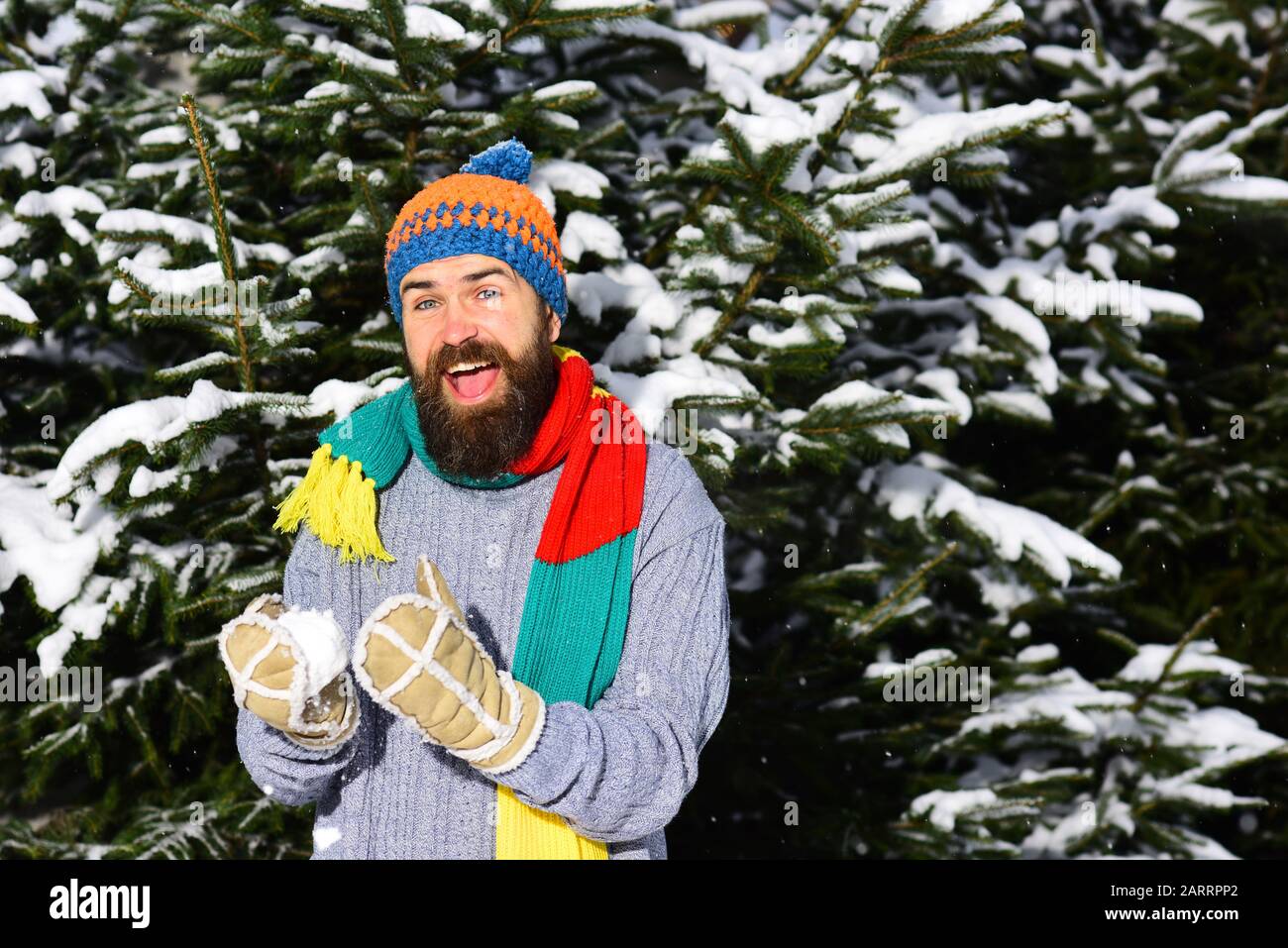 Happy winter vacation concept. Man with hat and scarf and gloves. Macho ...